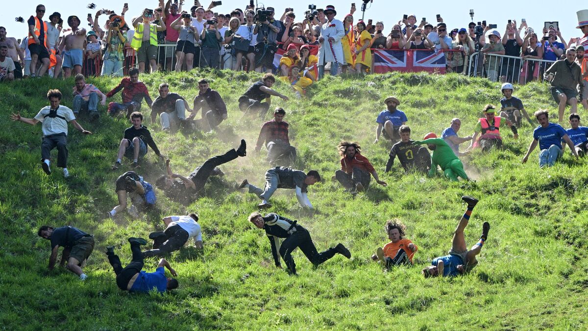 This year's cheese rolling at Cooper's Hill was a warm folk festival ...