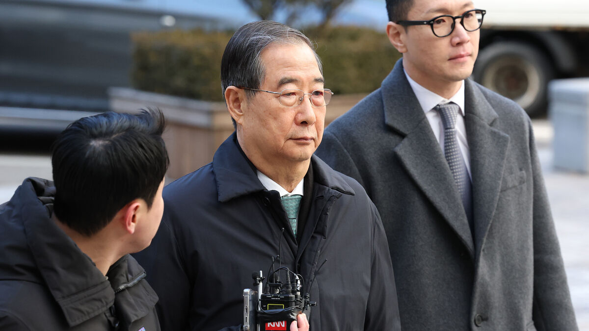Former South Korean prime minister Han Duck-Soo sentenced to 23 years ...